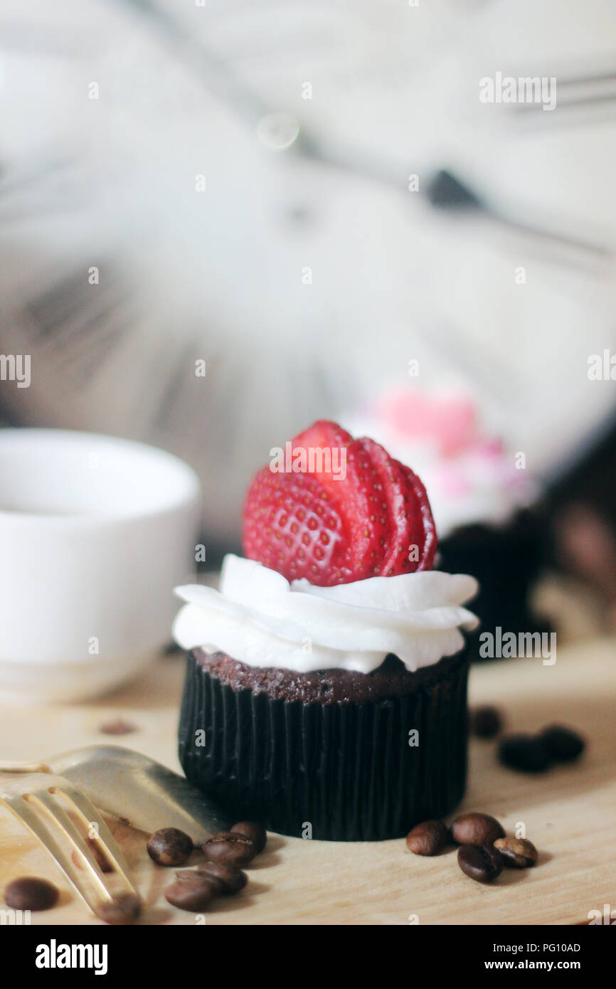 Chocolate cupcake with delicious cream Stock Photo - Alamy