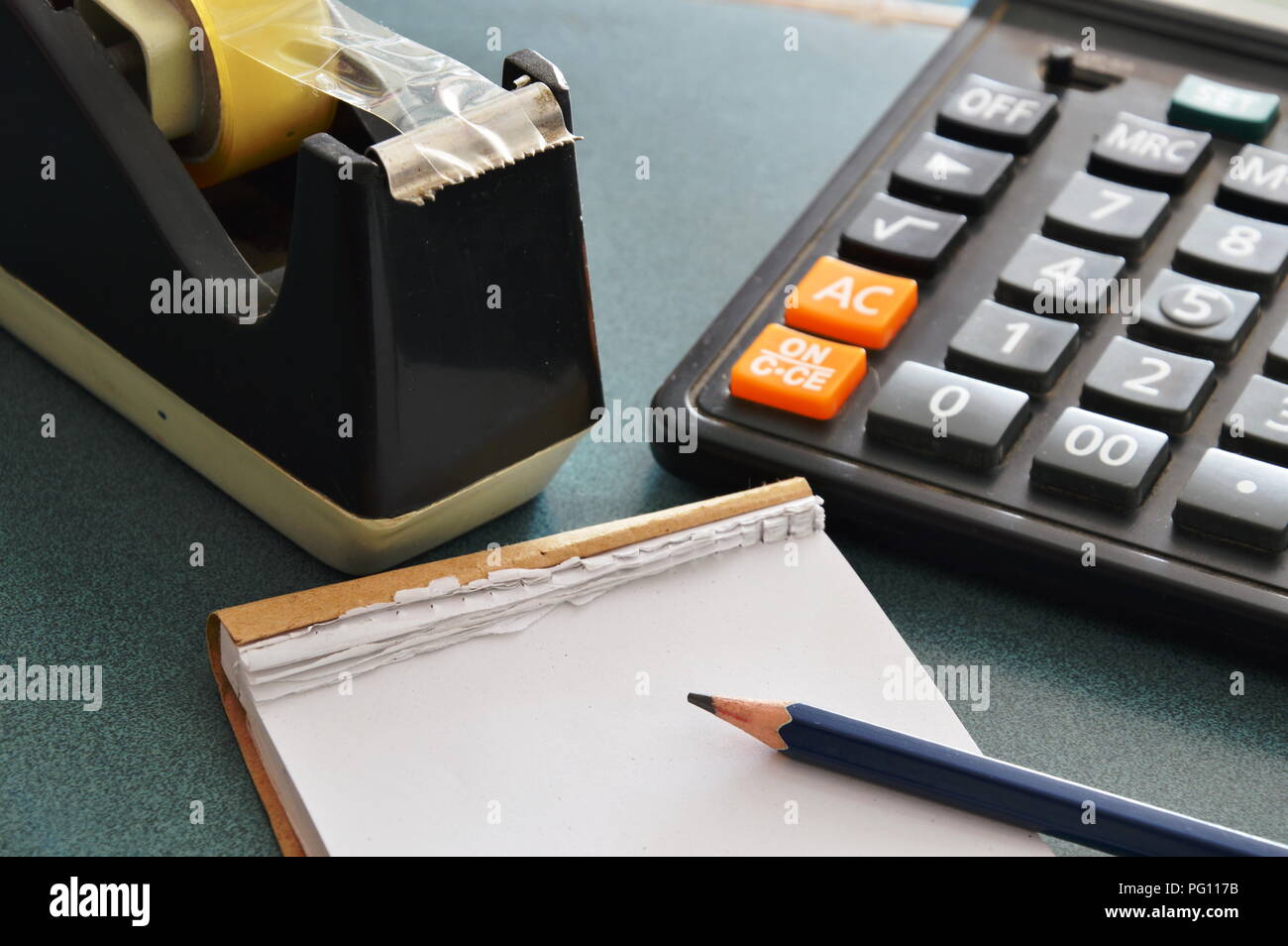 paper notebook and pencil on counter cashier in shop Stock Photo - Alamy