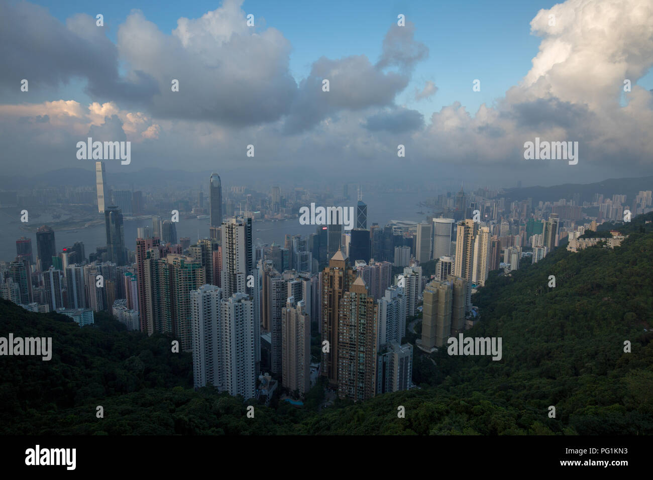 a big asia city by night to the sunrise with all the lights on the ...
