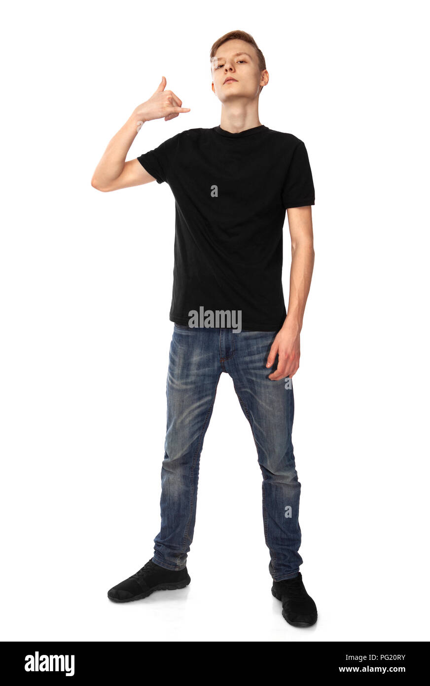 A young, handsome guy shows a gesture call me Stock Photo - Alamy