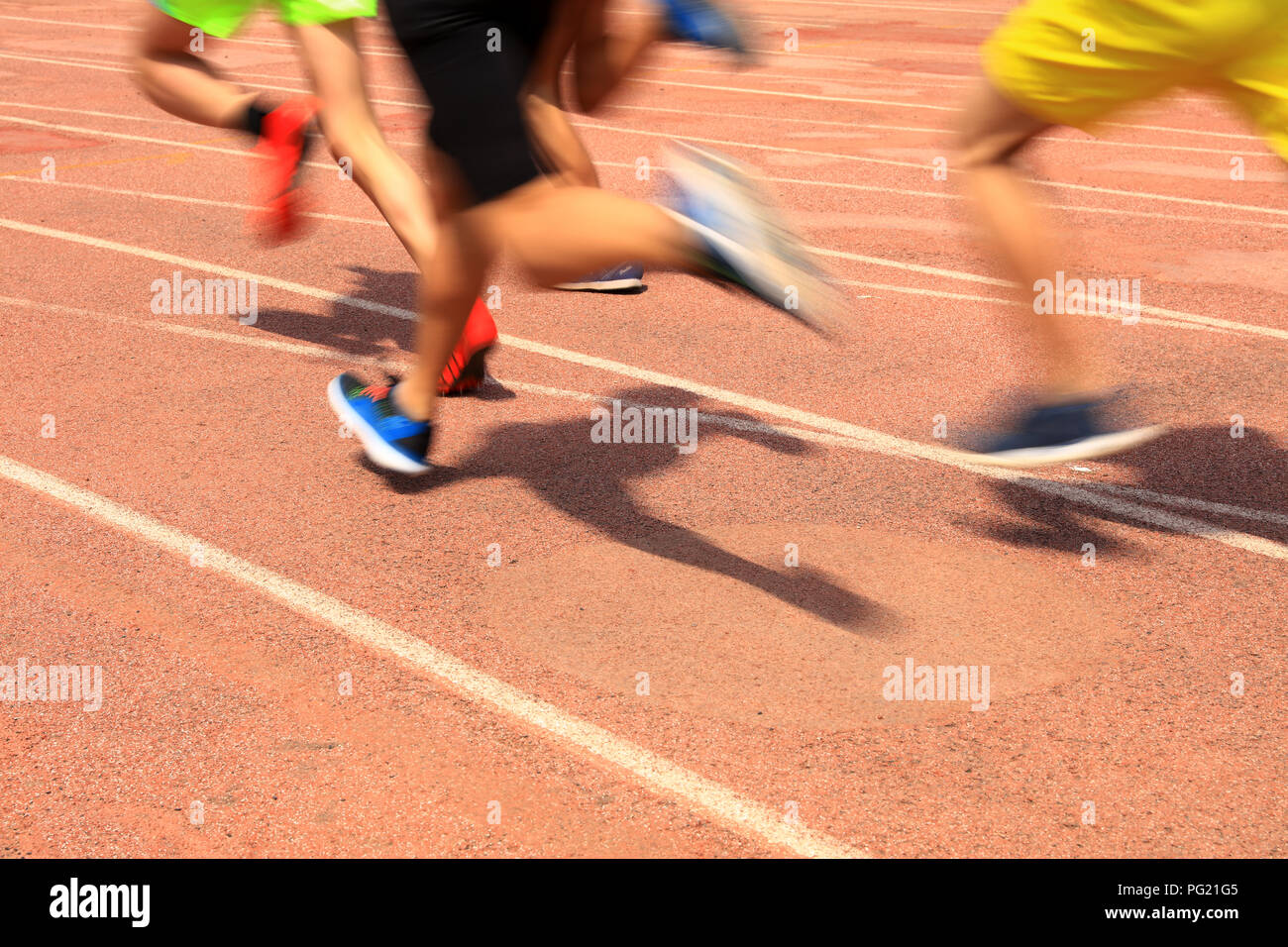 Athletes running in the playground of the runway, leg ministry close-up ...