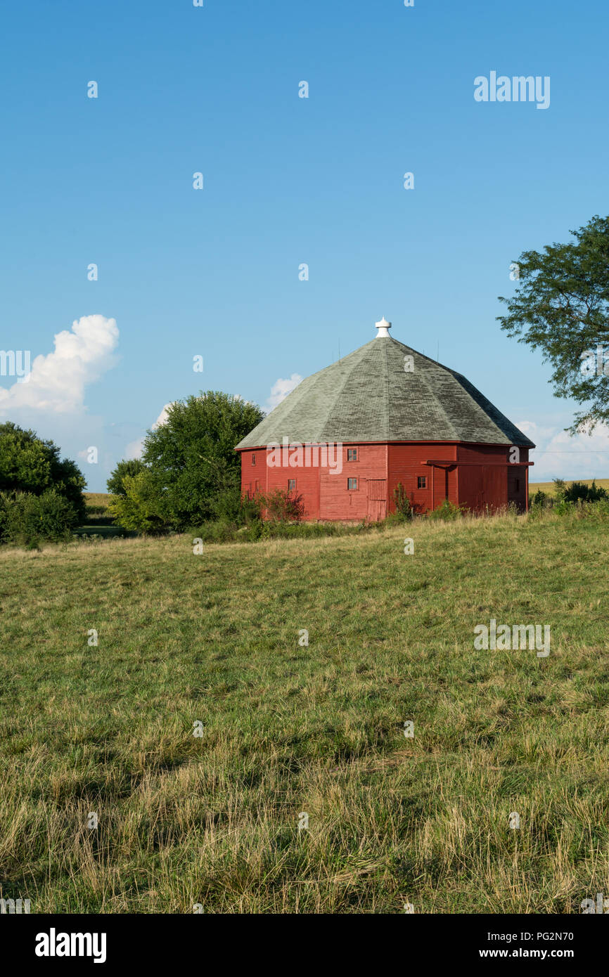 Unique round red barn surrounded by open farmland in rural illinois ...