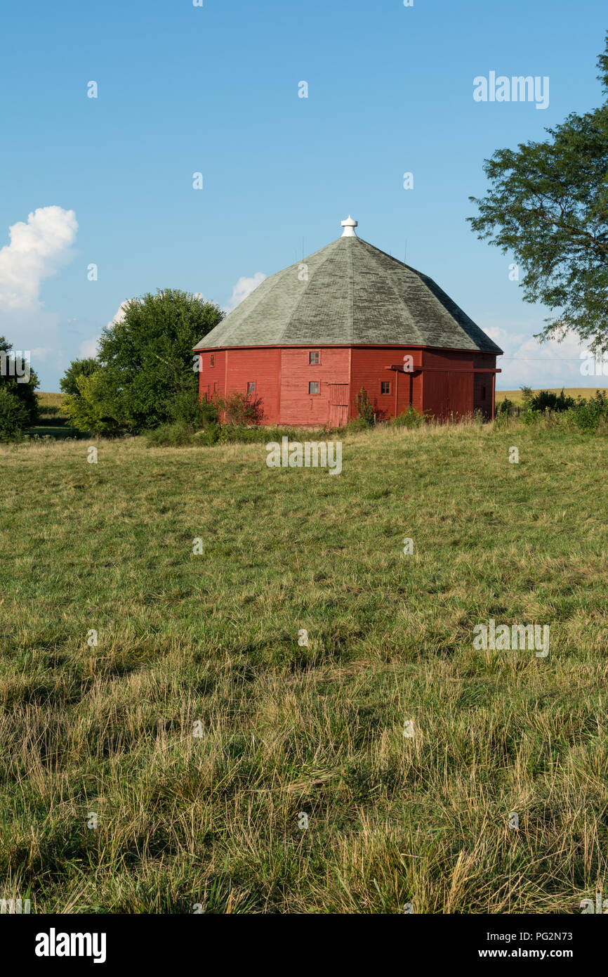 Unique round red barn surrounded by open farmland in rural illinois ...