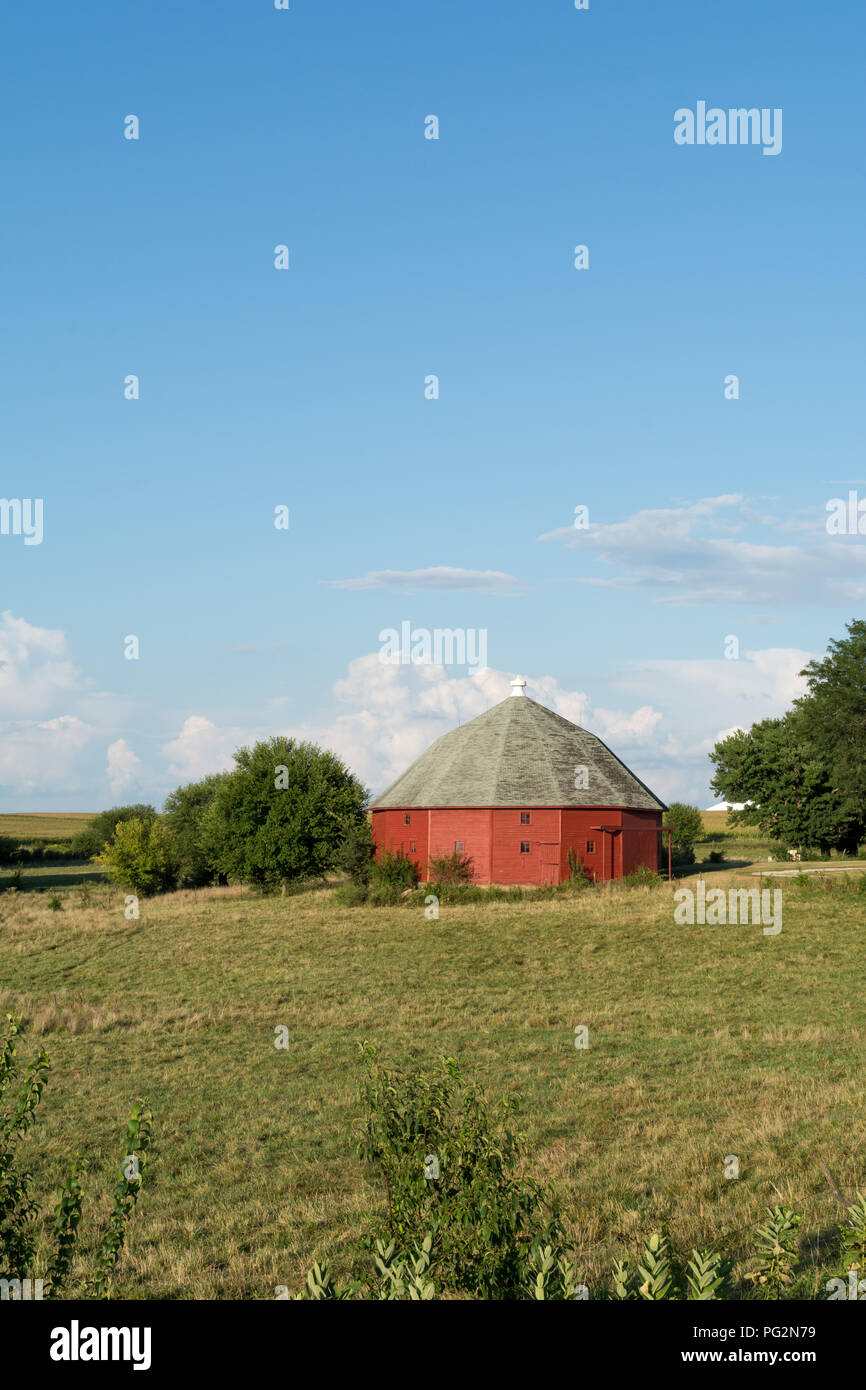 Unique round red barn surrounded by open farmland in rural illinois ...