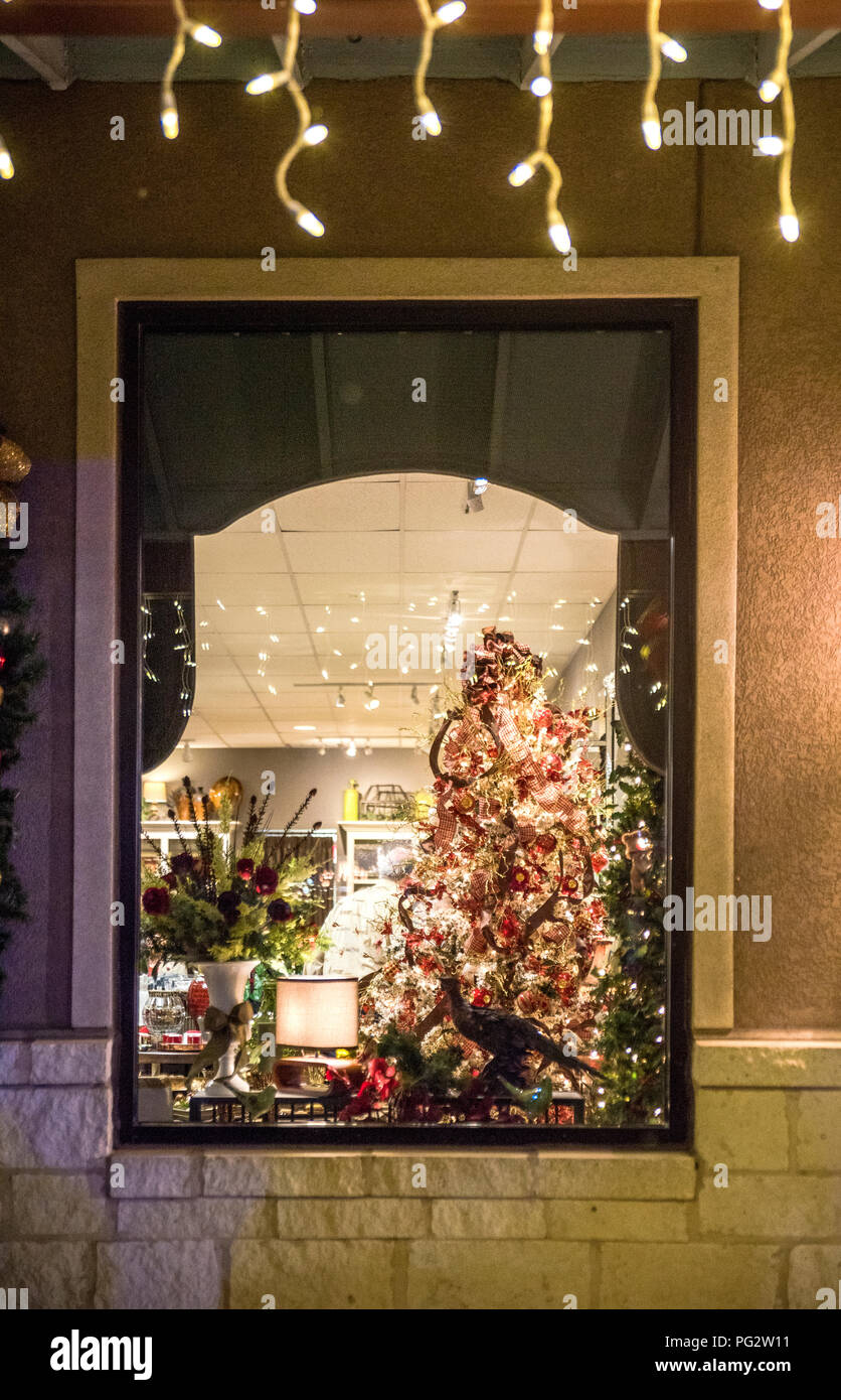 Beautiful storefront window decorated with Christmas light view of ...
