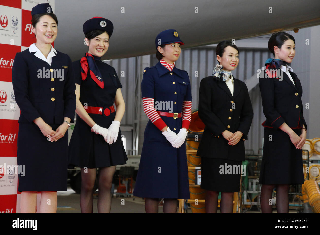 Tokyo, Japan. 23rd Aug, 2018. Japan Airlines (JAL) cabin attendants in ...