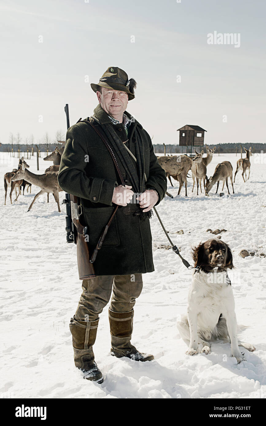 Dog and man on a hunting winter hi-res stock photography and images - Alamy