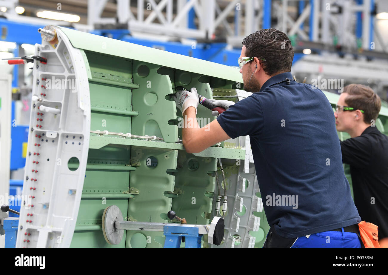 Bremen, Germany. 23rd Aug, 2018. Airbus employees are working on the ...