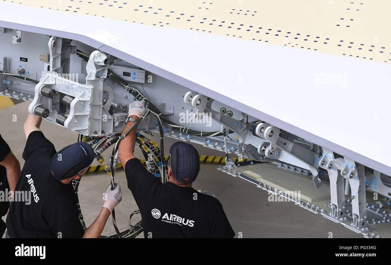 Bremen, Germany. 23rd Aug, 2018. Airbus employees are working on the ...
