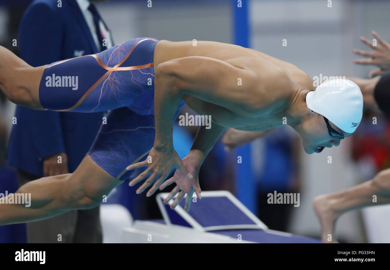 Jakarta, Indonesia. 23rd Aug, 2018. Yu Hexin of China enters water ...