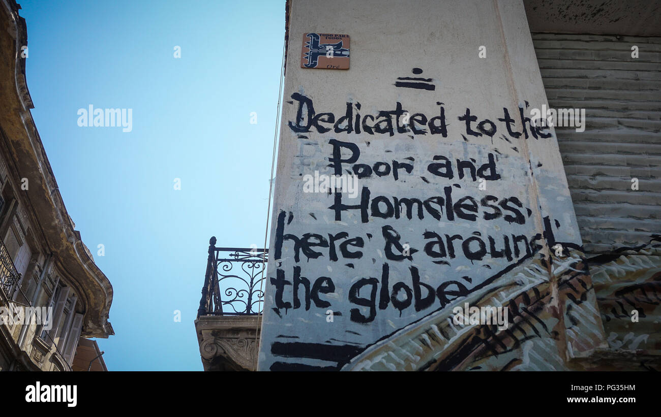 Athens, Greece. 20th Aug, 2018. A slogan is seen on a building in the ...