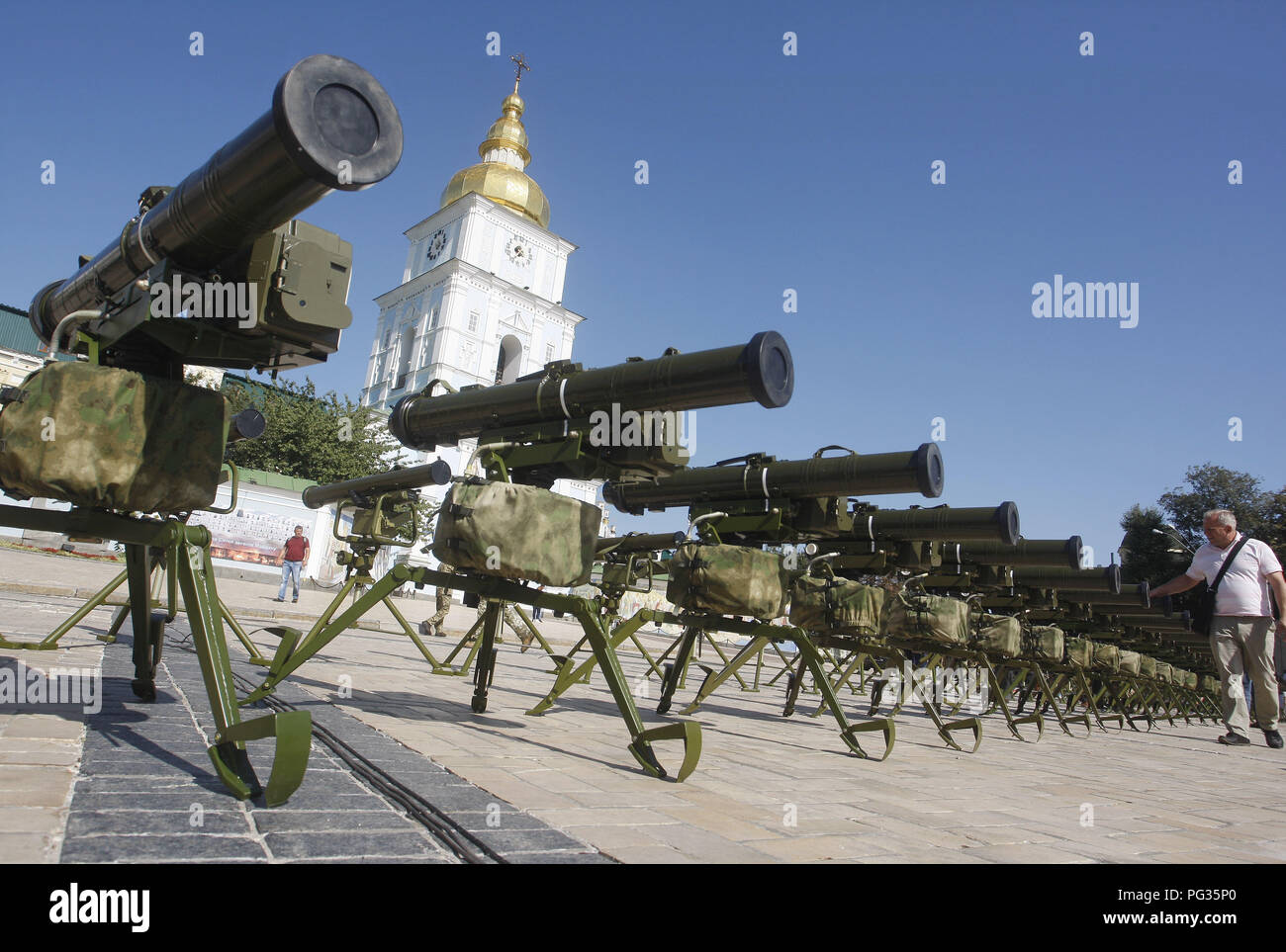 Kiev, Ukraine. 23rd Aug, 2018. A man looks on anti-tank missile systems ...