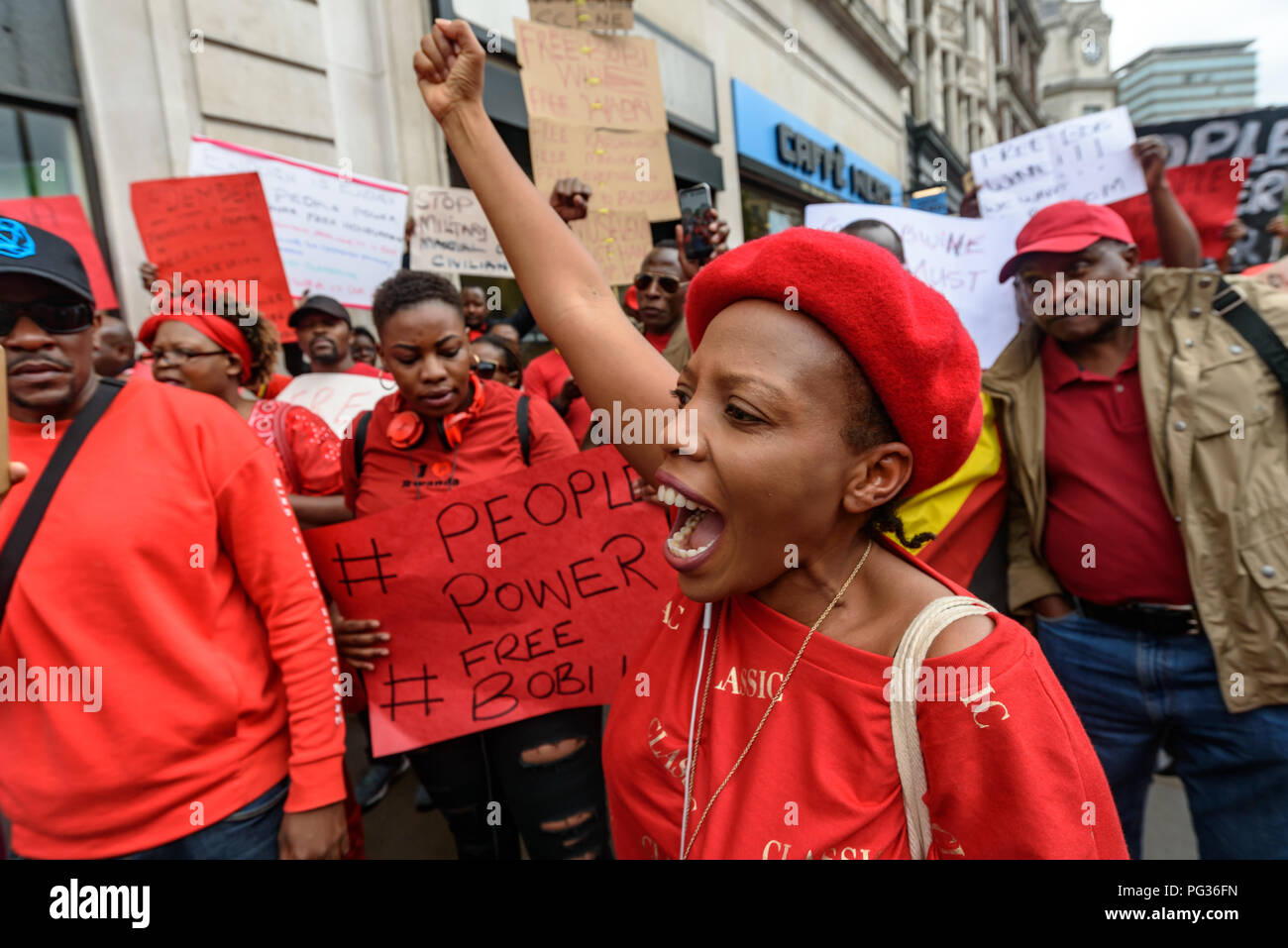 London, UK. 23rd August 2018. Hundreds of Ugandans, mainly dressed in ...