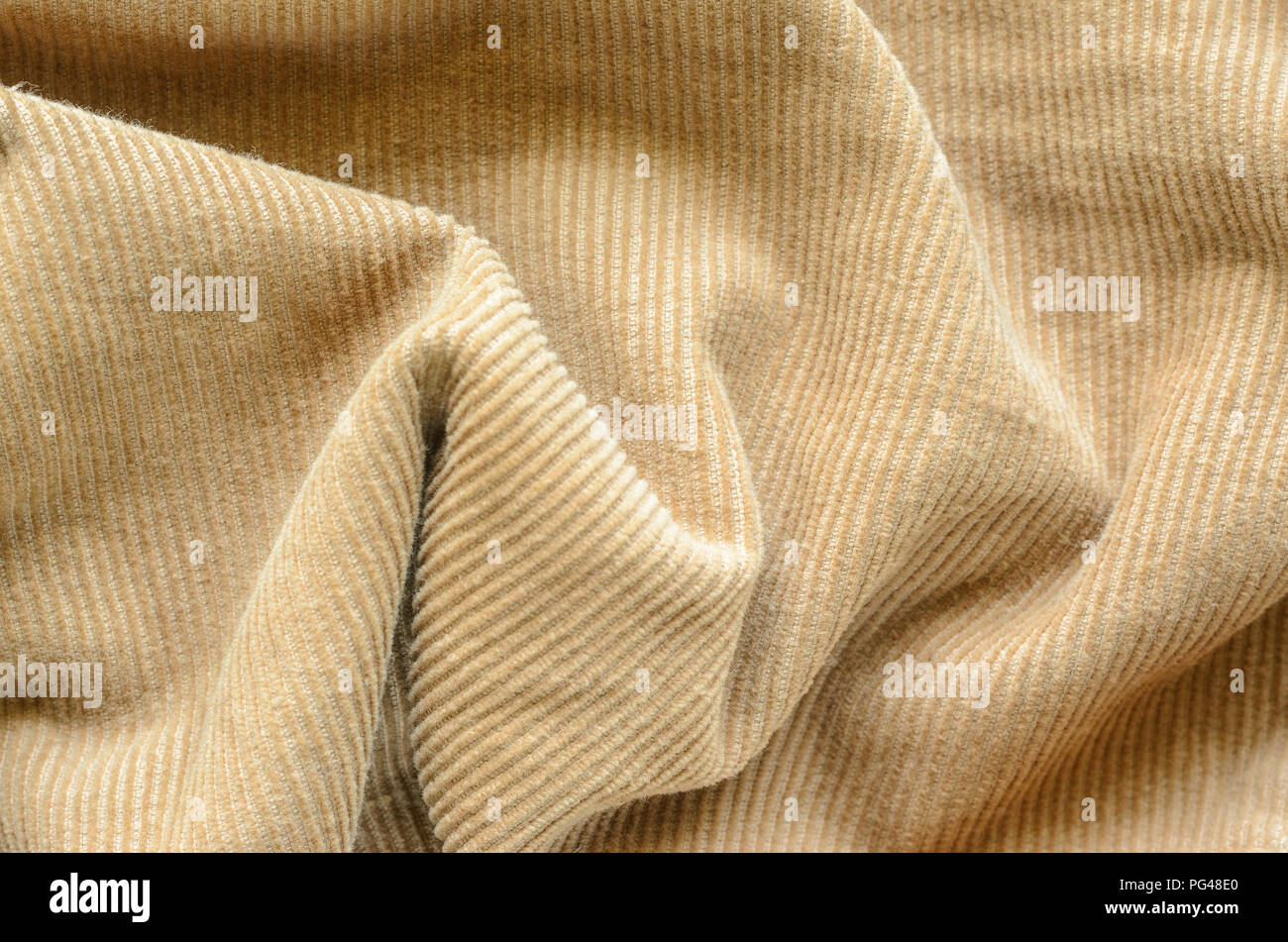 Texture of Soft Velvet Fabric with Folds Closeup. Texture of Beige ...