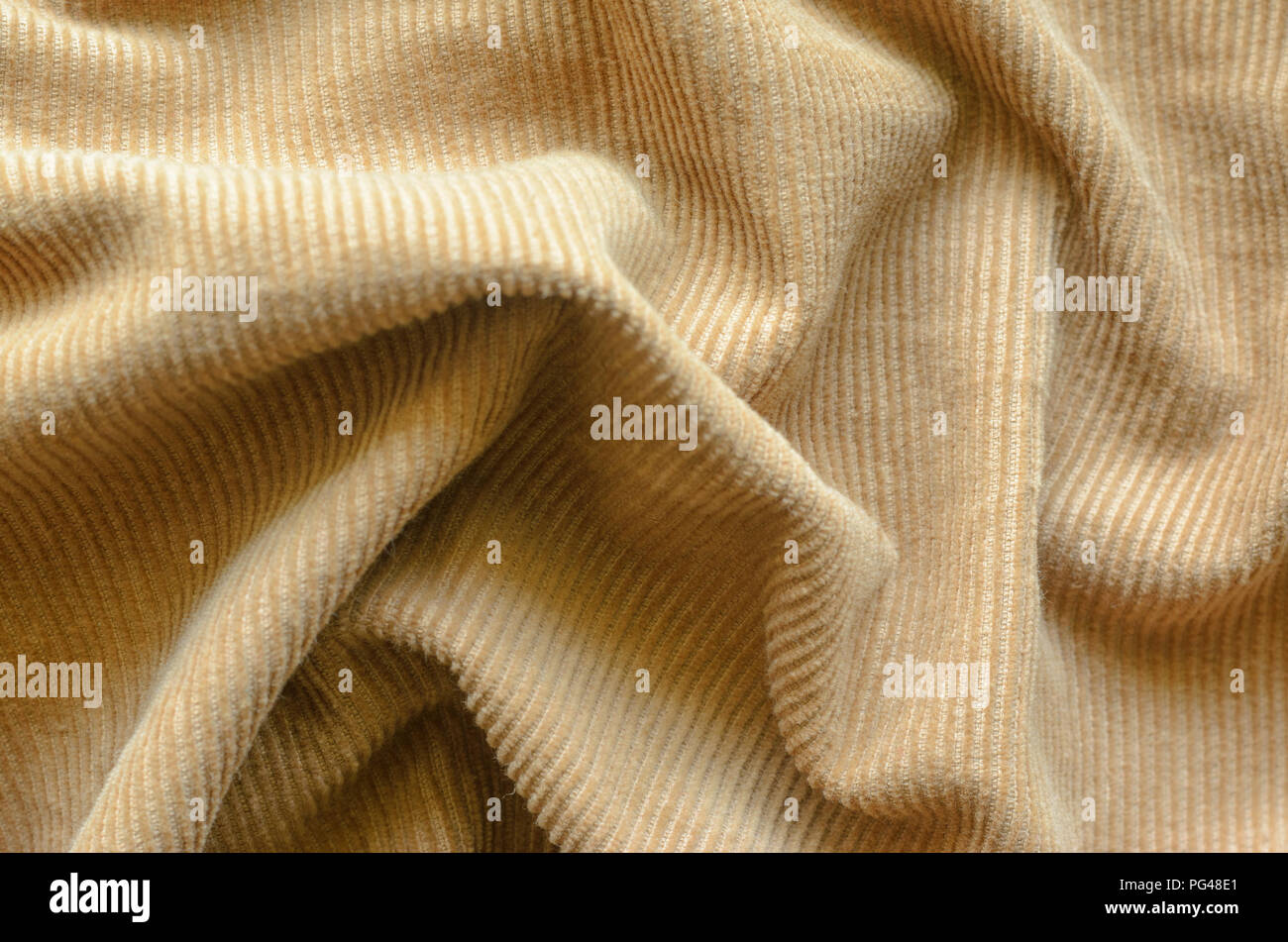 Texture of Soft Velvet Fabric with Folds Closeup. Texture of Beige ...