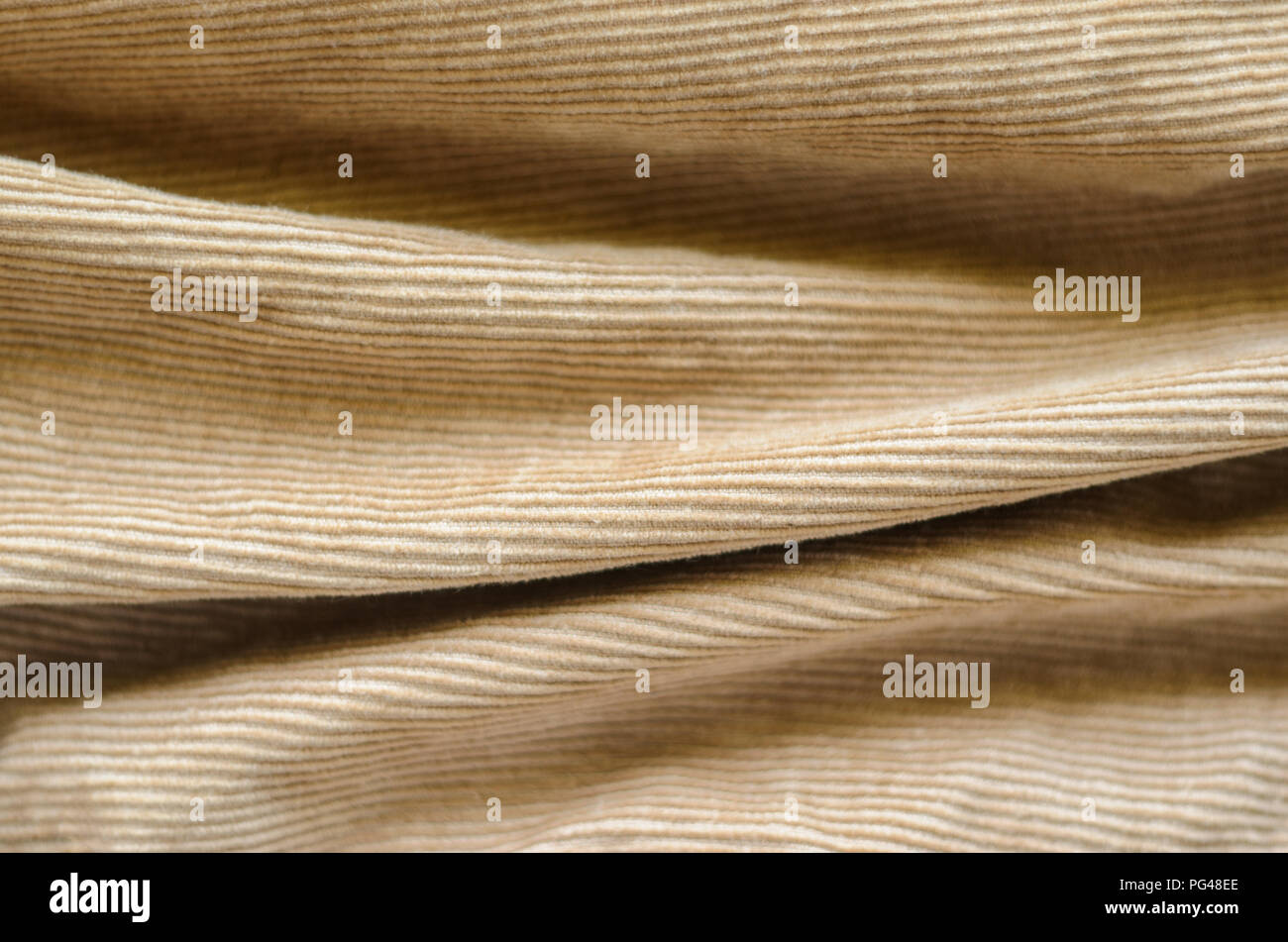 Texture of Soft Velvet Fabric with Folds Closeup. Texture of Beige ...