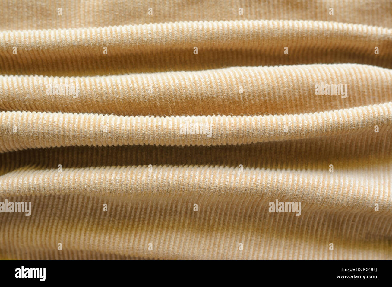 Texture of Soft Velvet Fabric with Folds Closeup. Texture of Beige ...