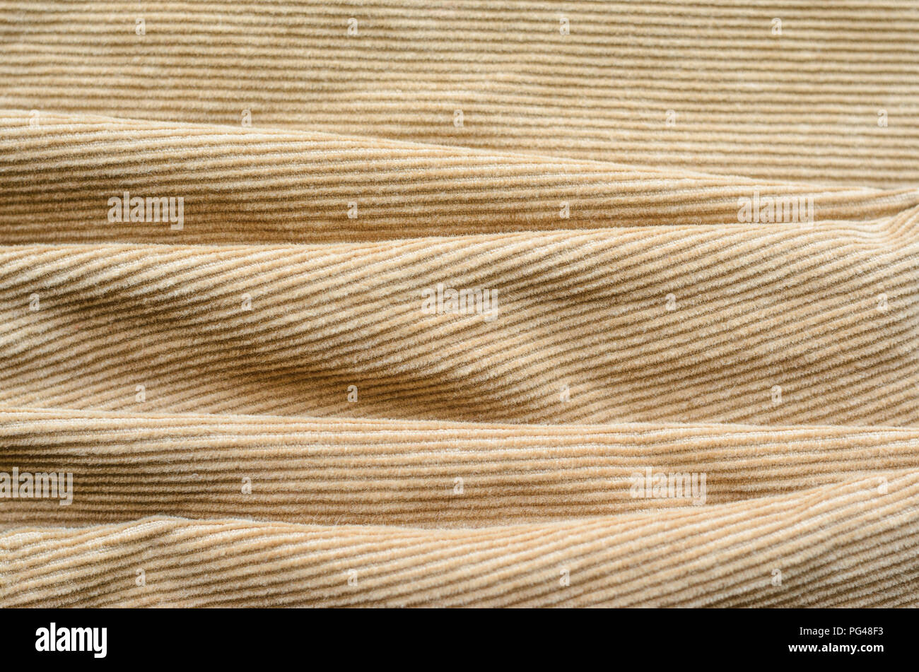 Texture of Soft Velvet Fabric with Folds Closeup. Texture of Beige ...
