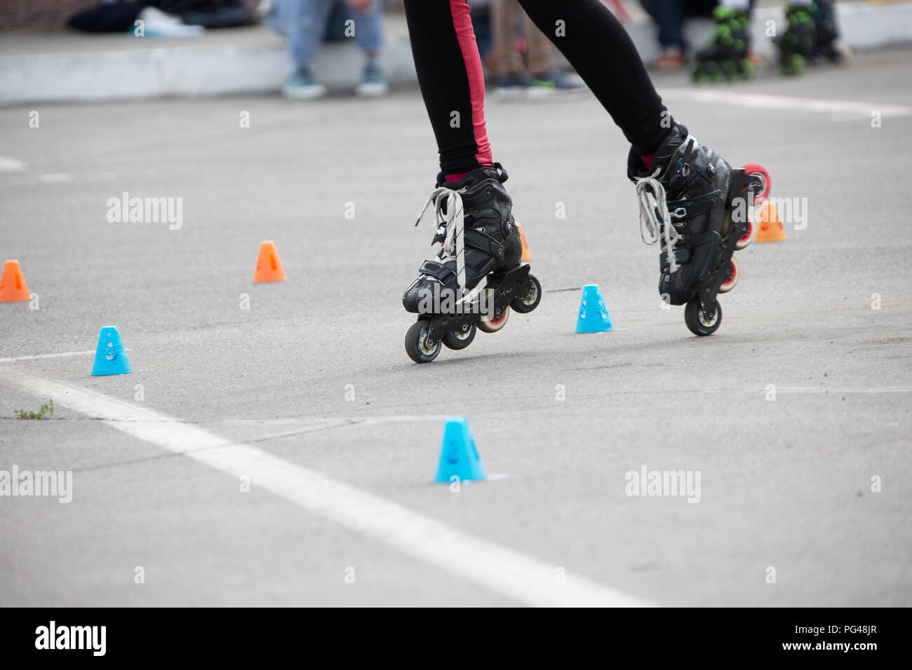 Competitions in roller sport.Roller skates and special chips Stock ...