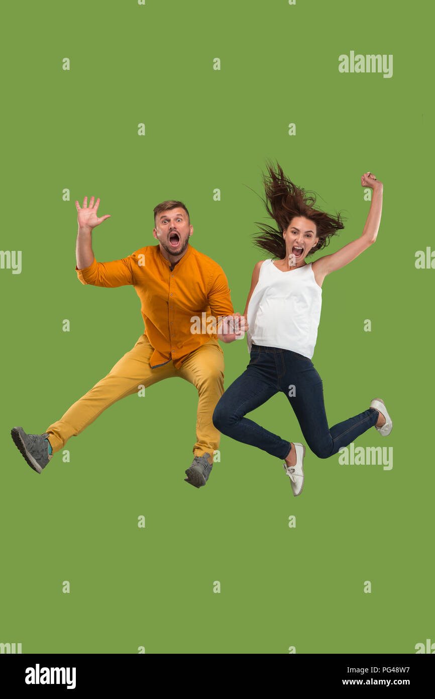 Freedom in moving and forward motion. The happy surprised young couple ...