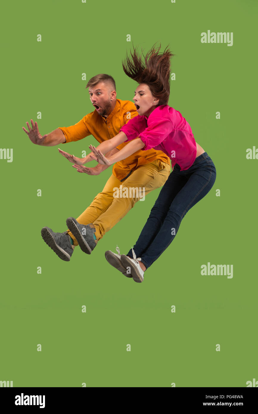 No. Freedom in moving and forward motion. The young couple jumping and ...