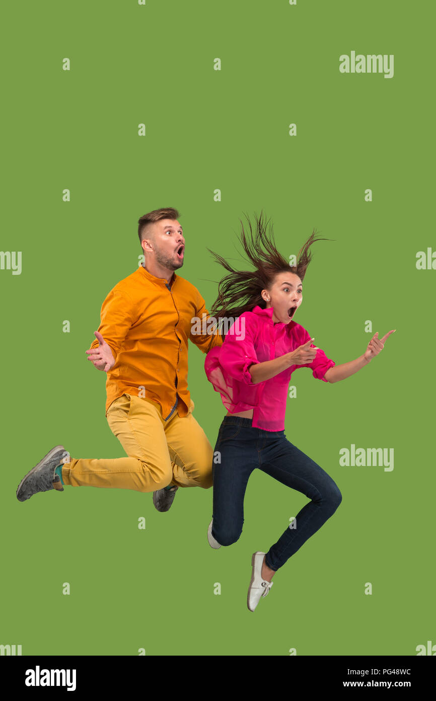 Freedom in moving and forward motion. The happy surprised young couple ...