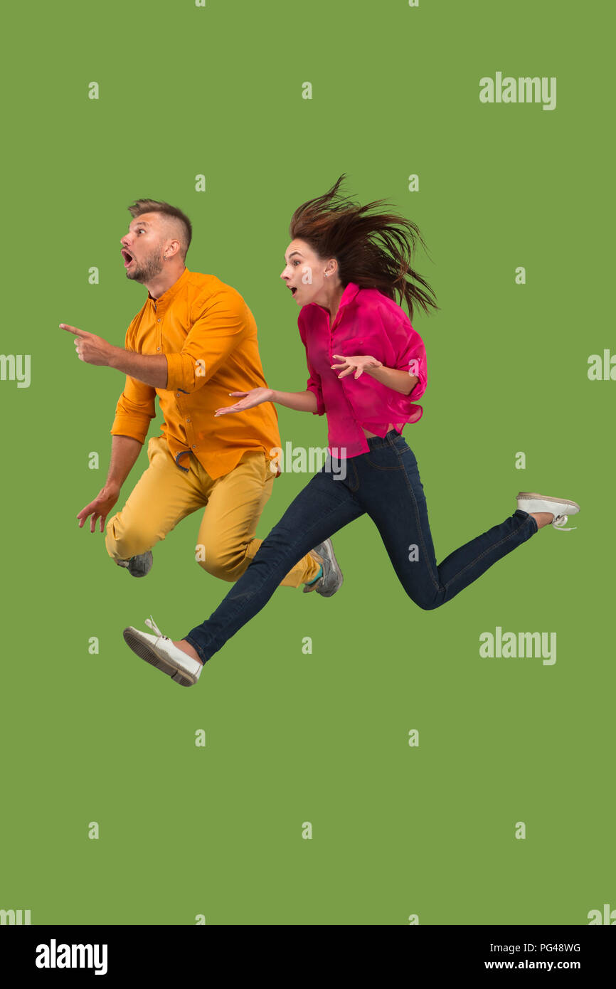 Freedom in moving and forward motion. The happy surprised young couple ...