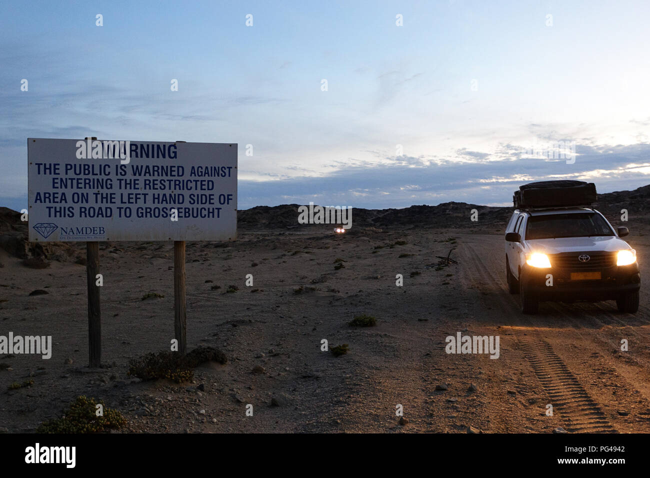 Car passing a road sign hi-res stock photography and images - Alamy