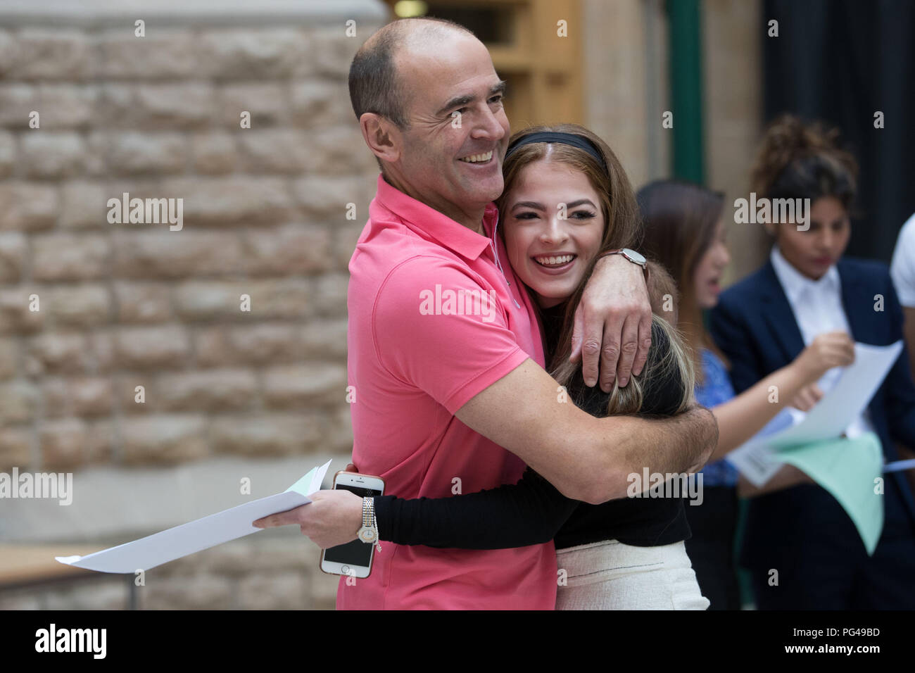 Lily Meakin collects her GCSE results with her father at the Nottingham ...