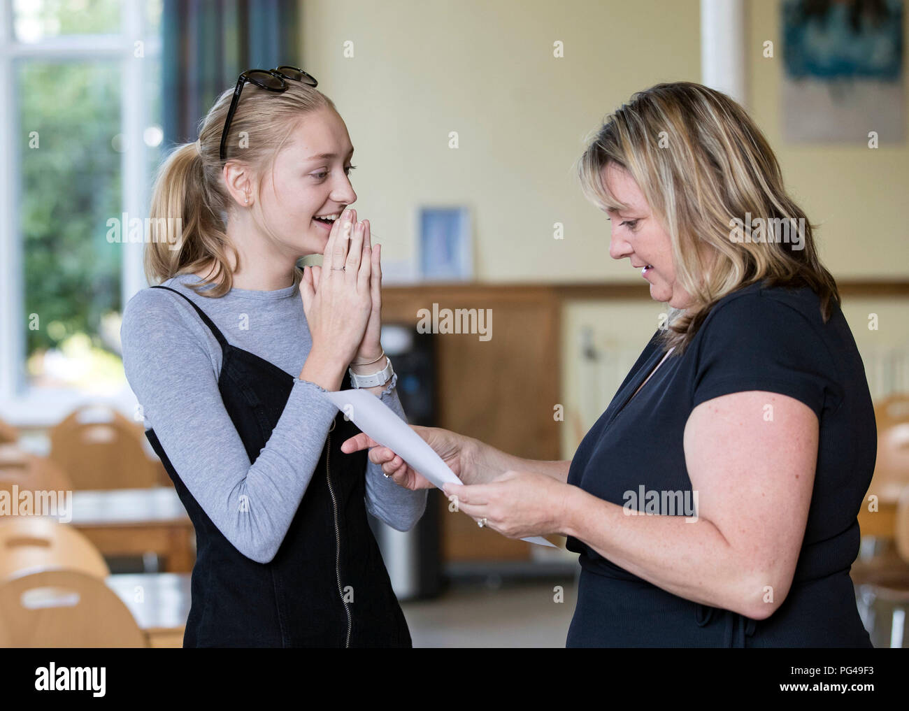 Joanna Milton (left) collects her GCSE results with mum Rachel Milton ...