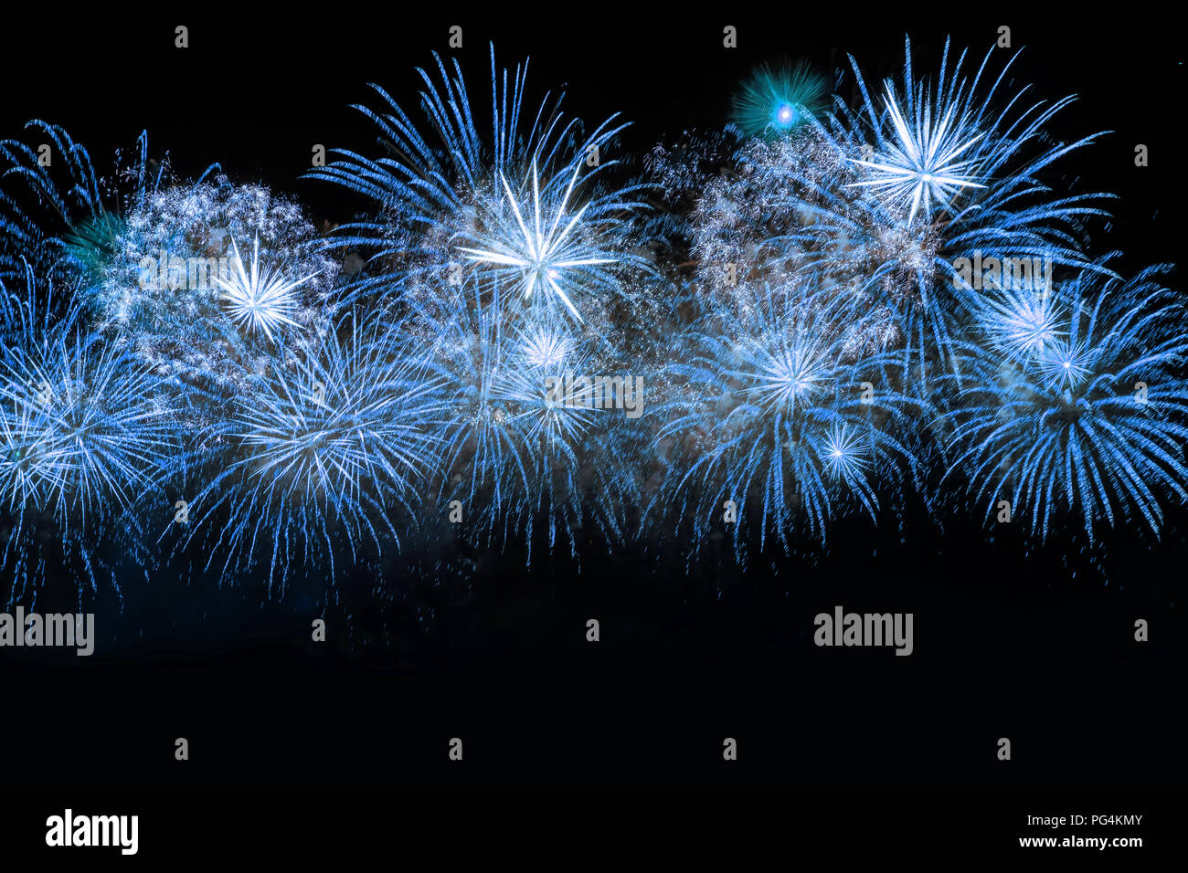 Blue fireworks background hi-res stock photography and images - Alamy
