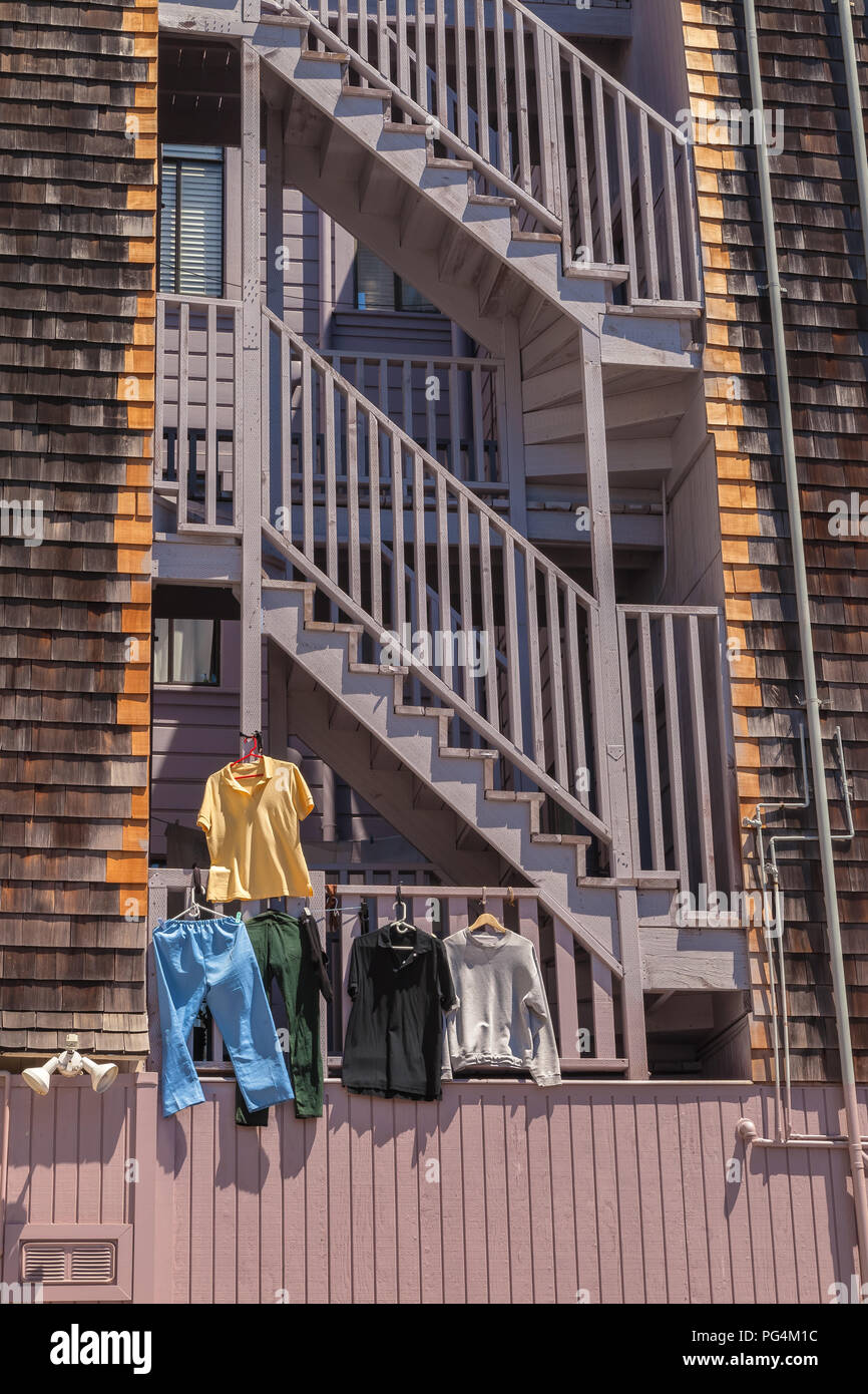 clothes hanging on the wooden stair rail for drying, San Francisco ...