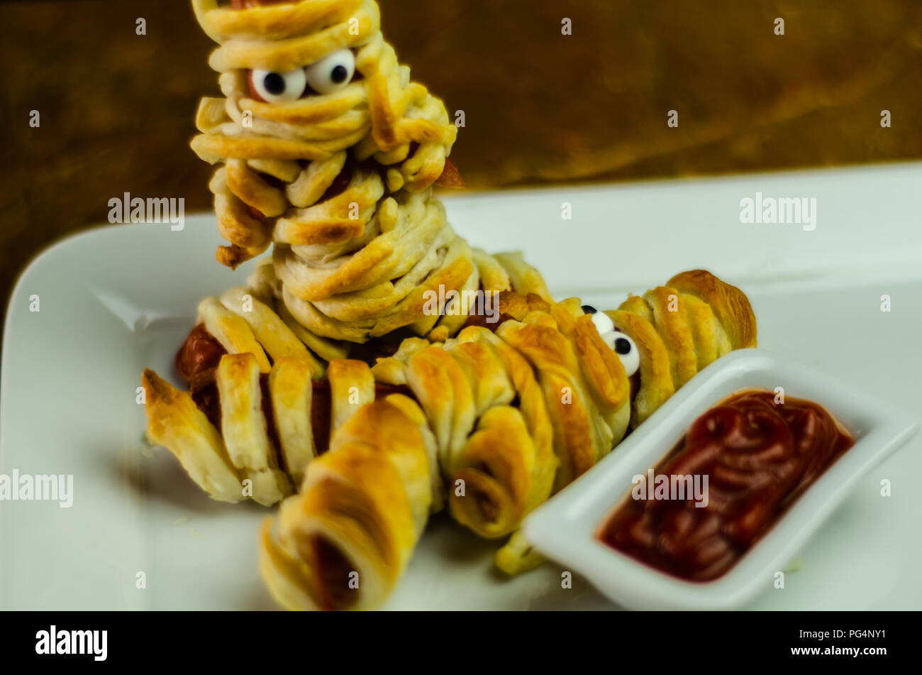 Sausage mummies in dough scary halloween food celebration party with ...