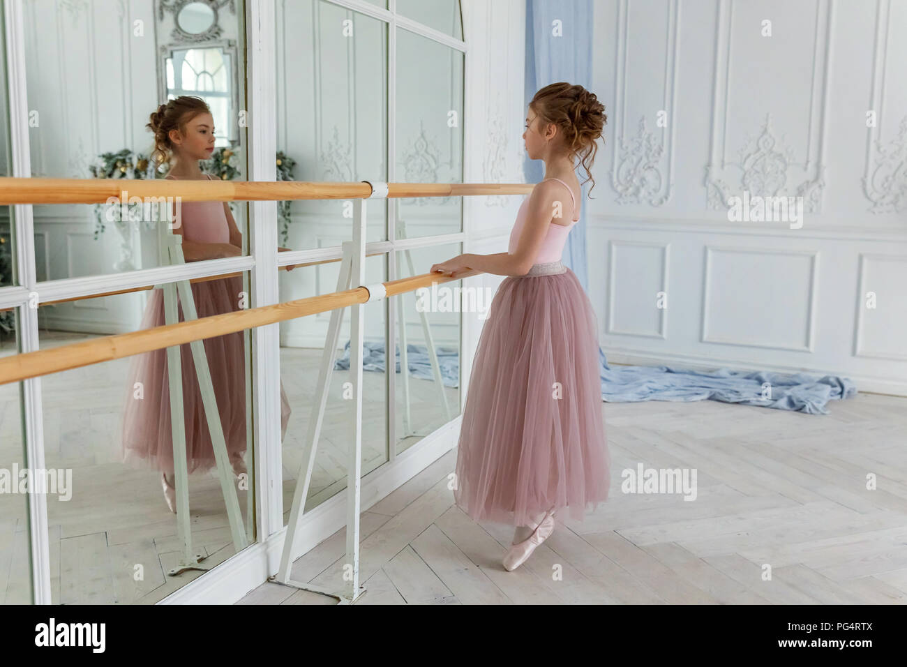 Young classical Ballet dancer side view. Beautiful graceful ballerine ...