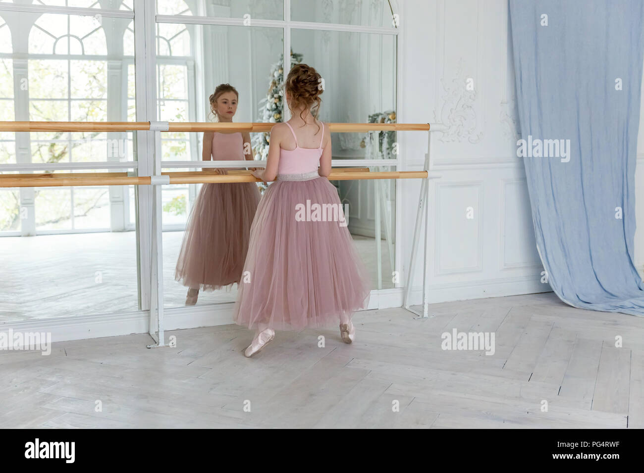 Young classical Ballet dancer side view. Beautiful graceful ballerine ...
