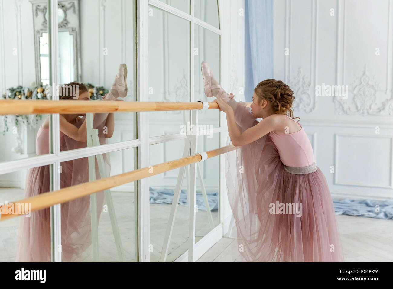 Young classical Ballet dancer side view. Beautiful graceful ballerine ...