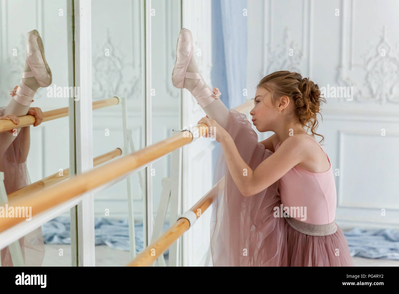 Young classical Ballet dancer side view. Beautiful graceful ballerine ...