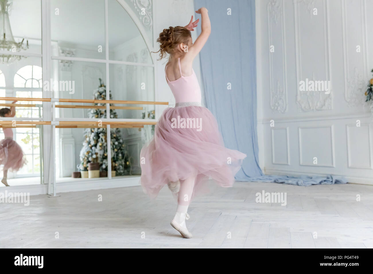 Young classical Ballet dancer side view. Beautiful graceful ballerine ...