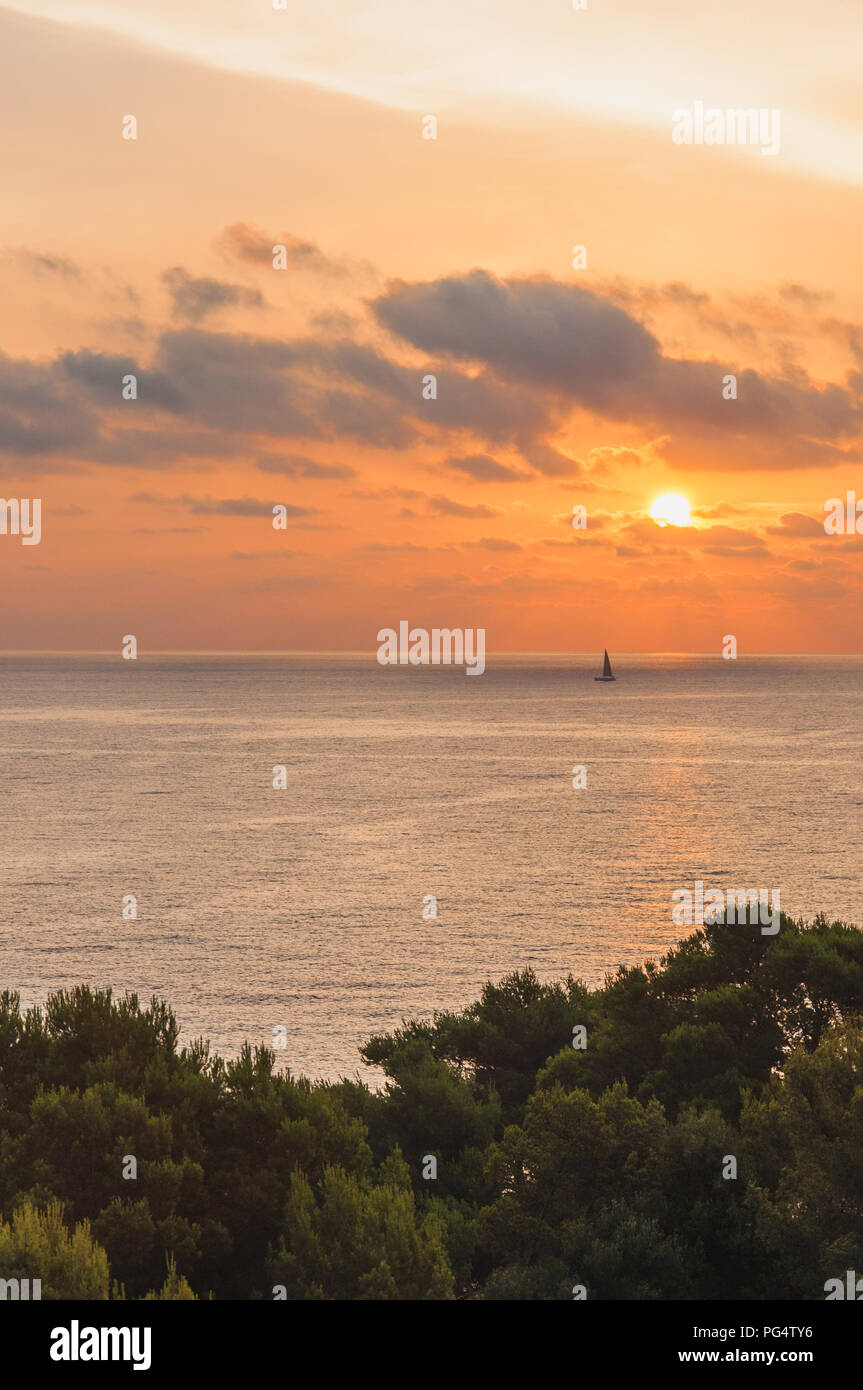 sunset over the sea in majorca Stock Photo - Alamy