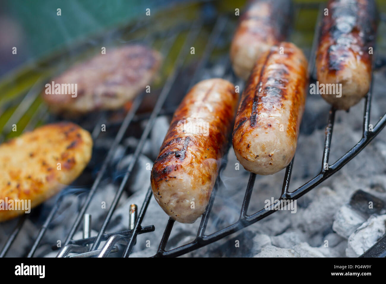 Food cooking on a barbecue grill Stock Photo - Alamy