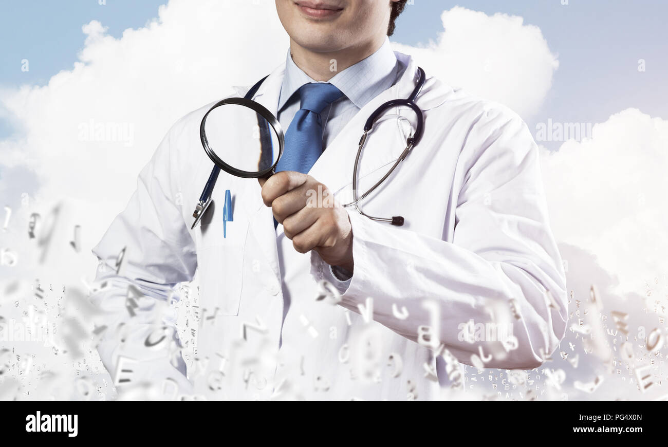 Doctor searching your diseases Stock Photo - Alamy