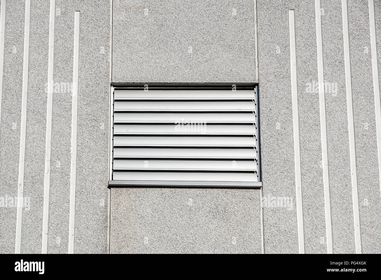 The modern facade of an office building with window rows and metal ...