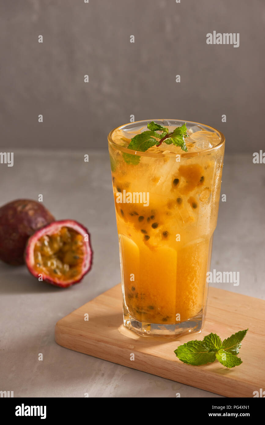 Glass of fresh drink passion fruit tea Stock Photo - Alamy