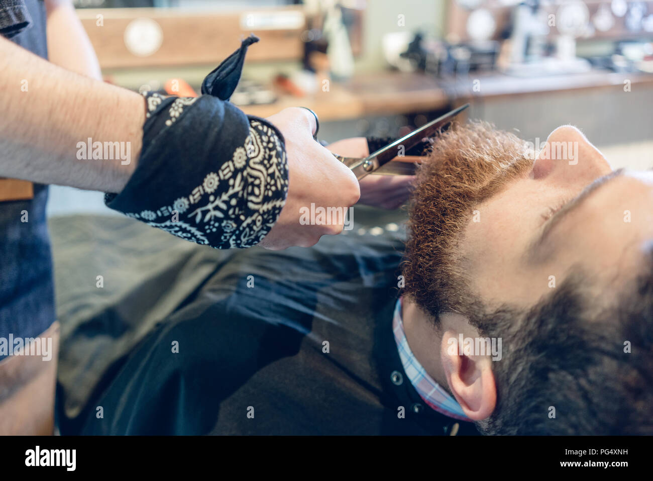 Male barber cutting beard scissors hi-res stock photography and images ...