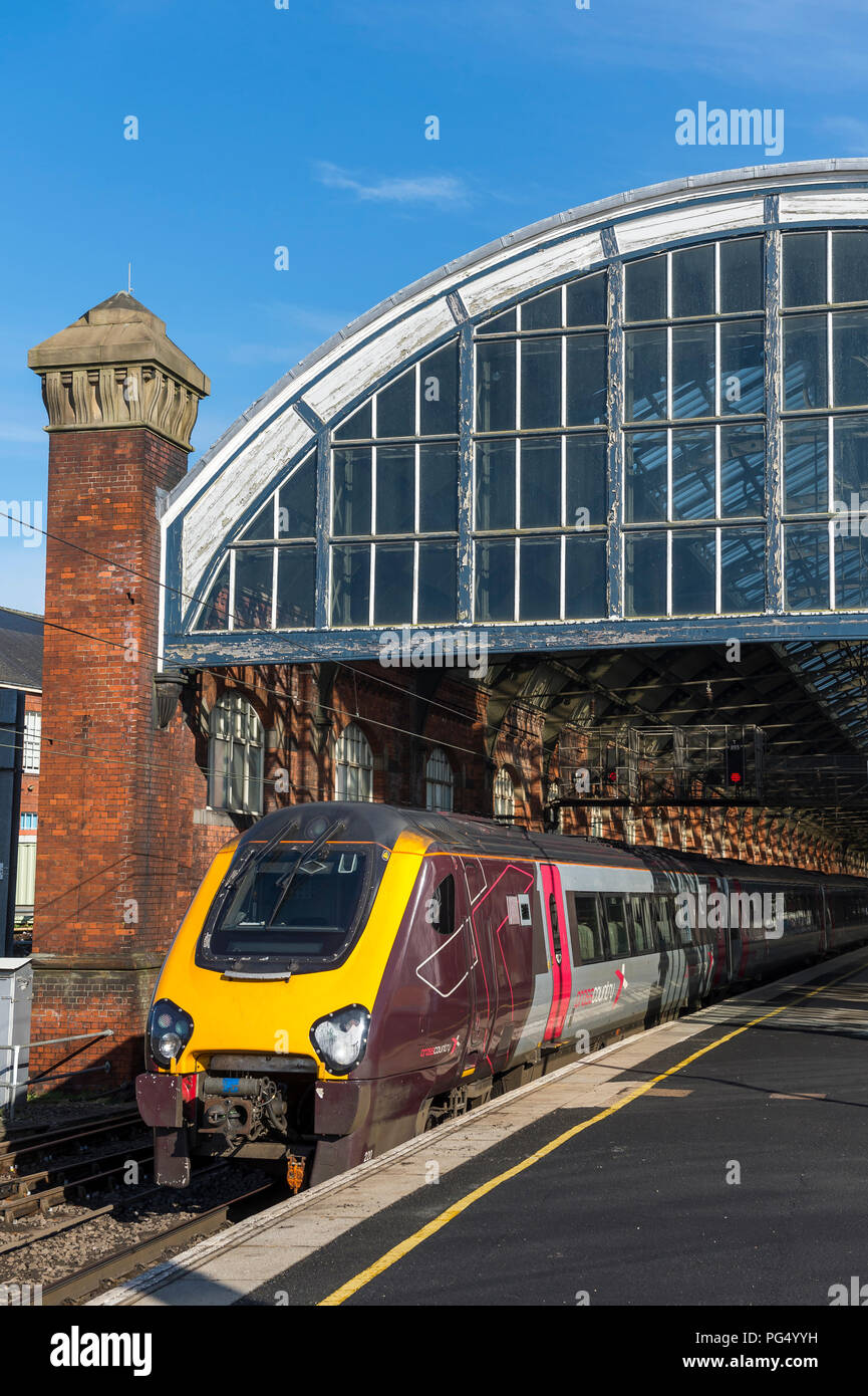 Class 220 Voyager passenger train in CrossCountry livery at a platform ...