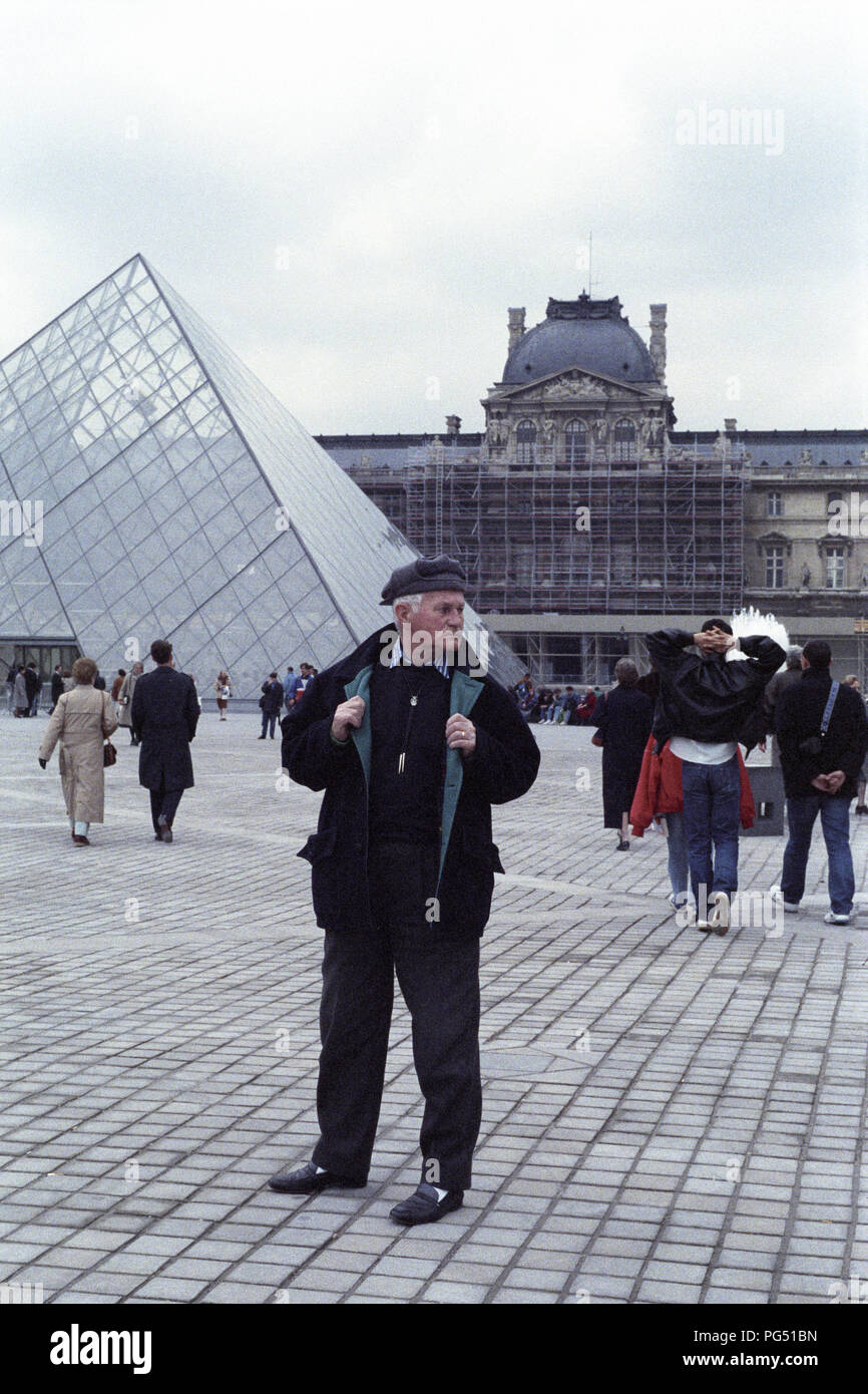 The Czech writer Bohumil Hrabal in front of the glass pyramid of the ...
