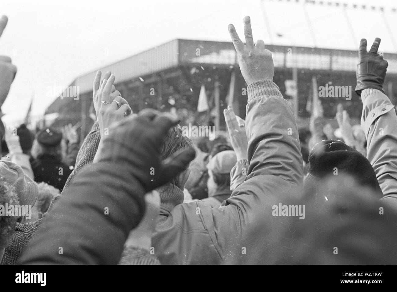 "Participants show the ""Victory"" hand sign at a demonstration in ...