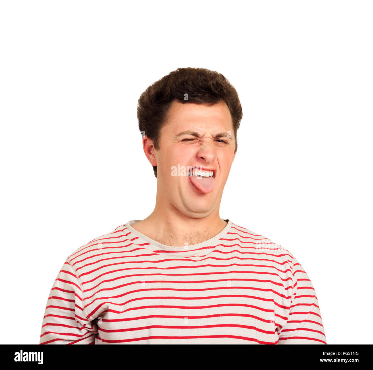 a young man looking shocked and frightened pull out his tongue in ...