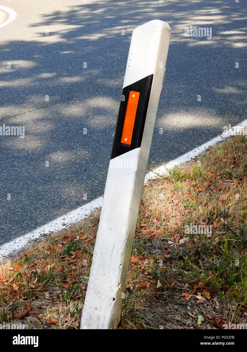 Damaged marker post Stock Photo - Alamy