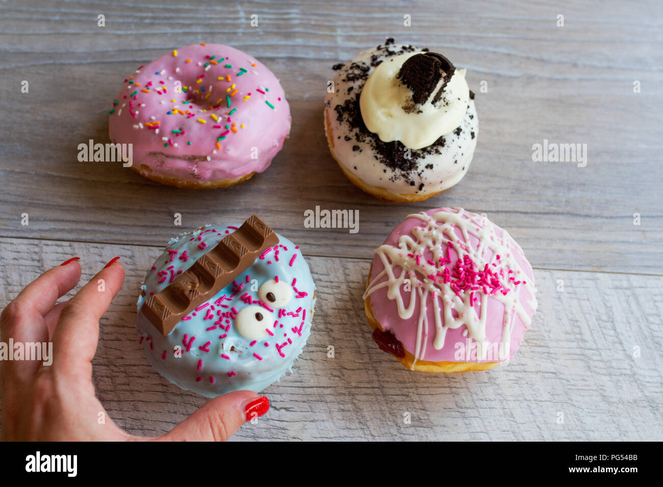 Various donuts from above Stock Photo - Alamy